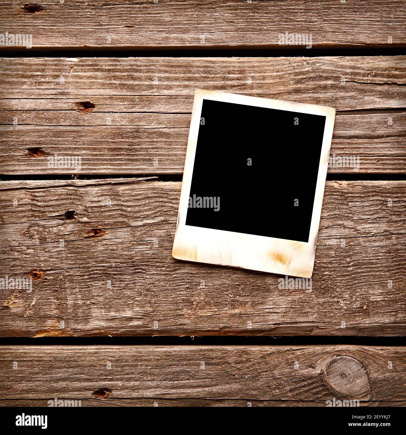 Blank instant photo frame on wooden background Stock Photo - Alamy