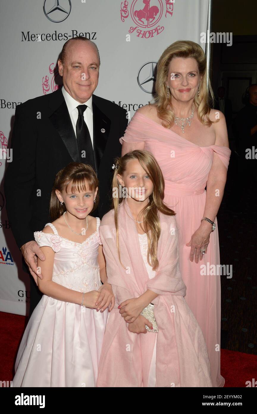 Nancy Davis with husband Ken Rickel and daughters Isabella Rickel and ...