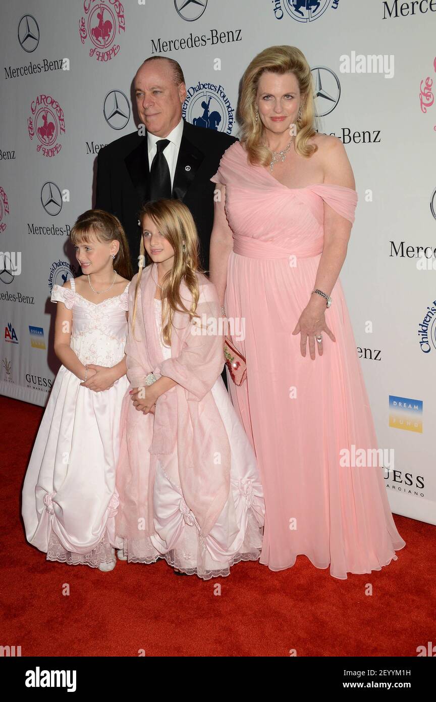 Nancy Davis with husband Ken Rickel and daughters Isabella Rickel and ...