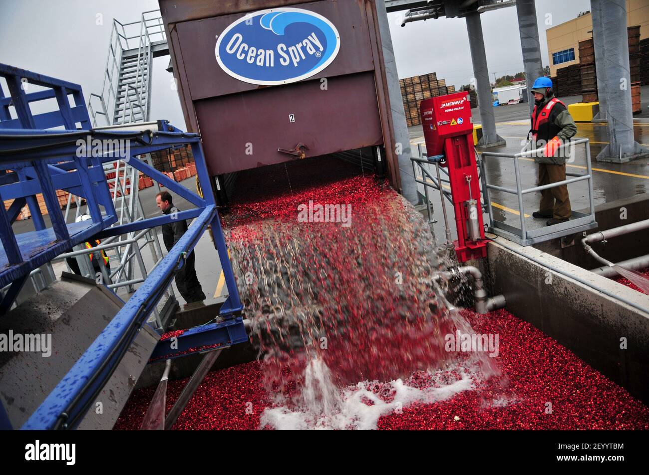 22 October 2012 - Richmond, B.C., Canada - A worker watches as the flow ...