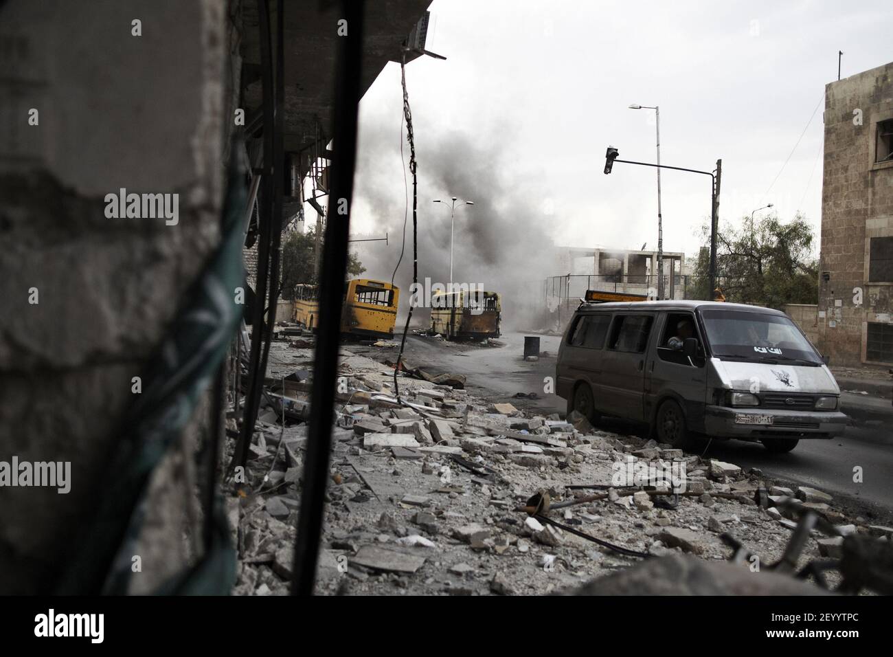 23 October 2012 - Aleppo, Syria - Civilian cars are targeted by a ...