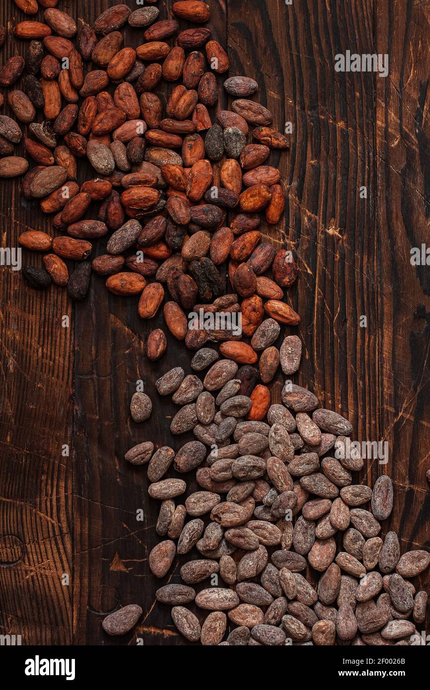 Raw cocoa beans two types Venezuela on brown background Stock Photo - Alamy