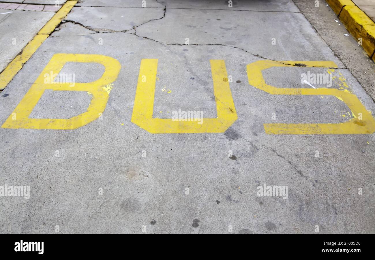 Bus stop symbol on road, public transport, vehicle Stock Photo - Alamy
