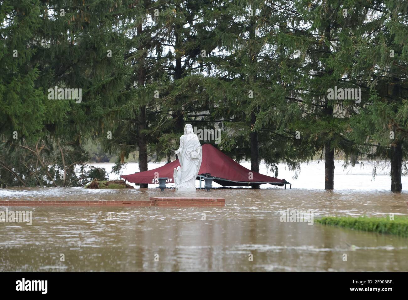 OCT 30, 2012 : A statue of Jesus is nearly under water at Resthaven ...