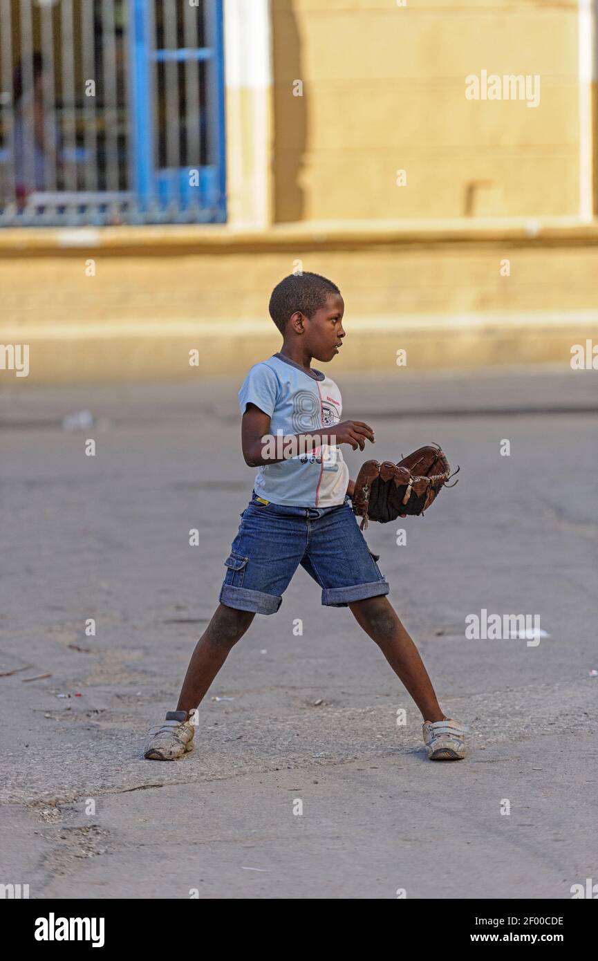 Young hispanic boy play catch hi-res stock photography and images - Alamy