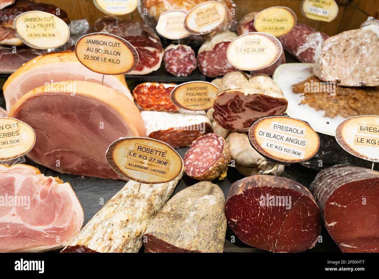 Variety of meat displayed in butcher's shop, France Stock Photo - Alamy