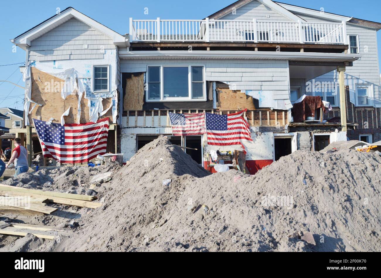 11 November 2012 - New York, NY - American flags are seen in the debris ...
