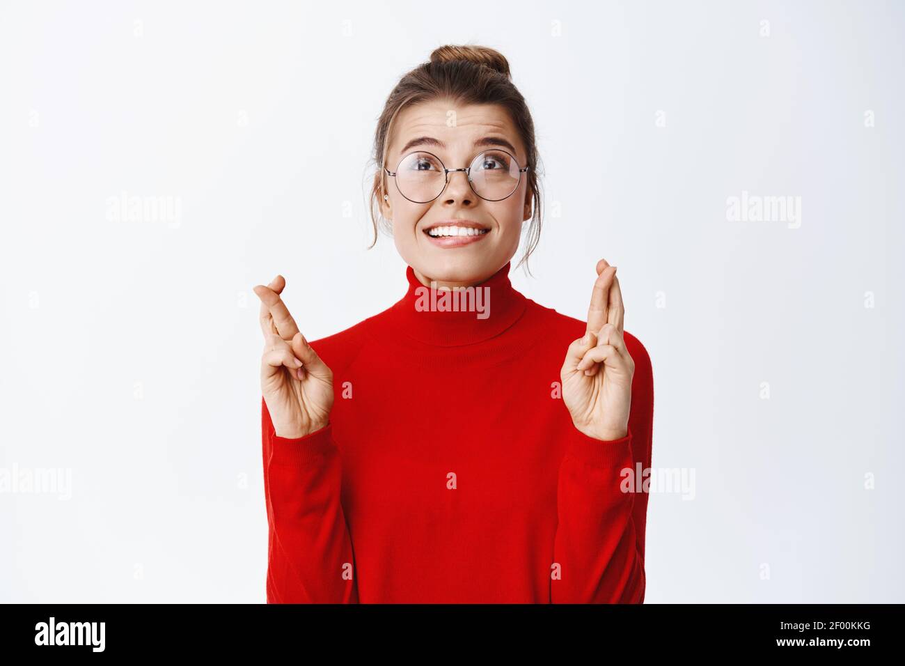 Young hopeful woman begging god for dream come true, looking up in sky ...