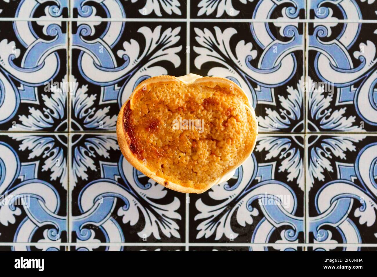 Top view of portuguese cheesecake called Queijada de Sintra on ...