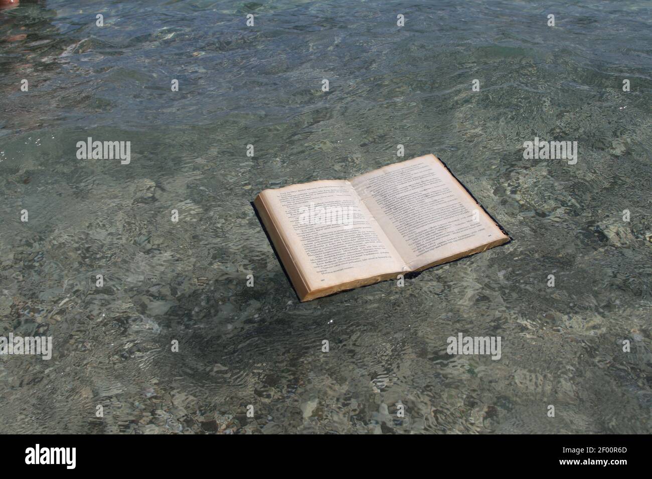 book drifting on water Stock Photo - Alamy