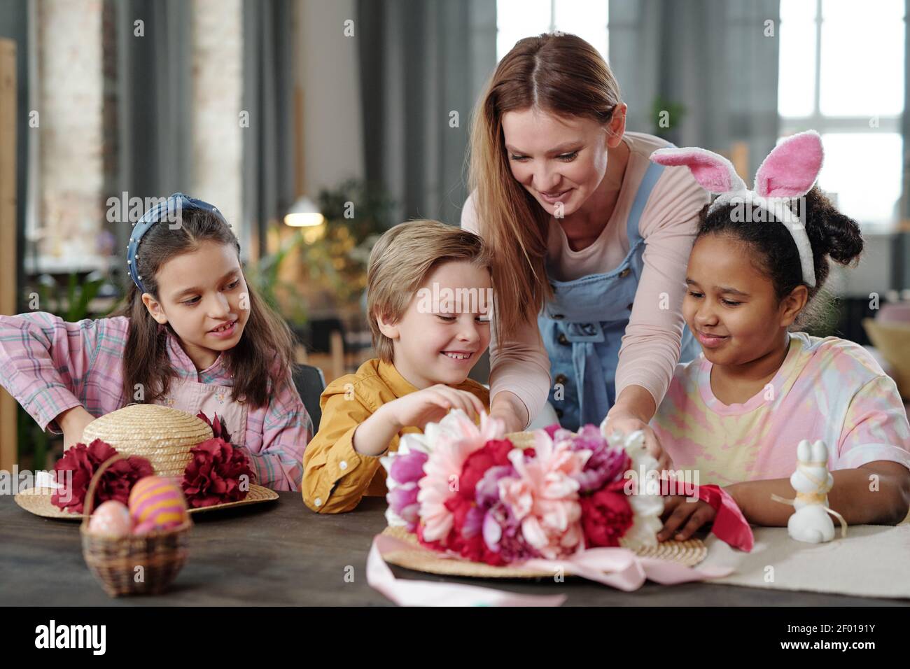 Woman bending over table hi-res stock photography and images - Alamy