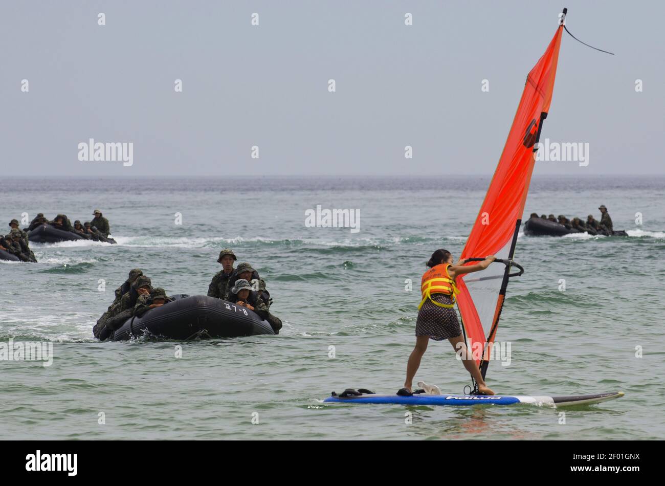 30 July 2012 - Gangreung, South Korea - A female civilian is ...