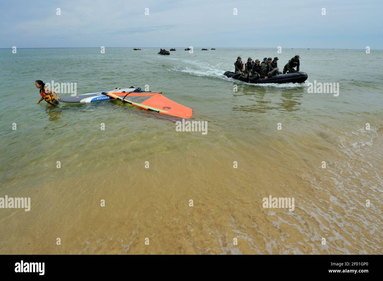 30 July 2012 - Gangreung, South Korea - A female civilian is ...