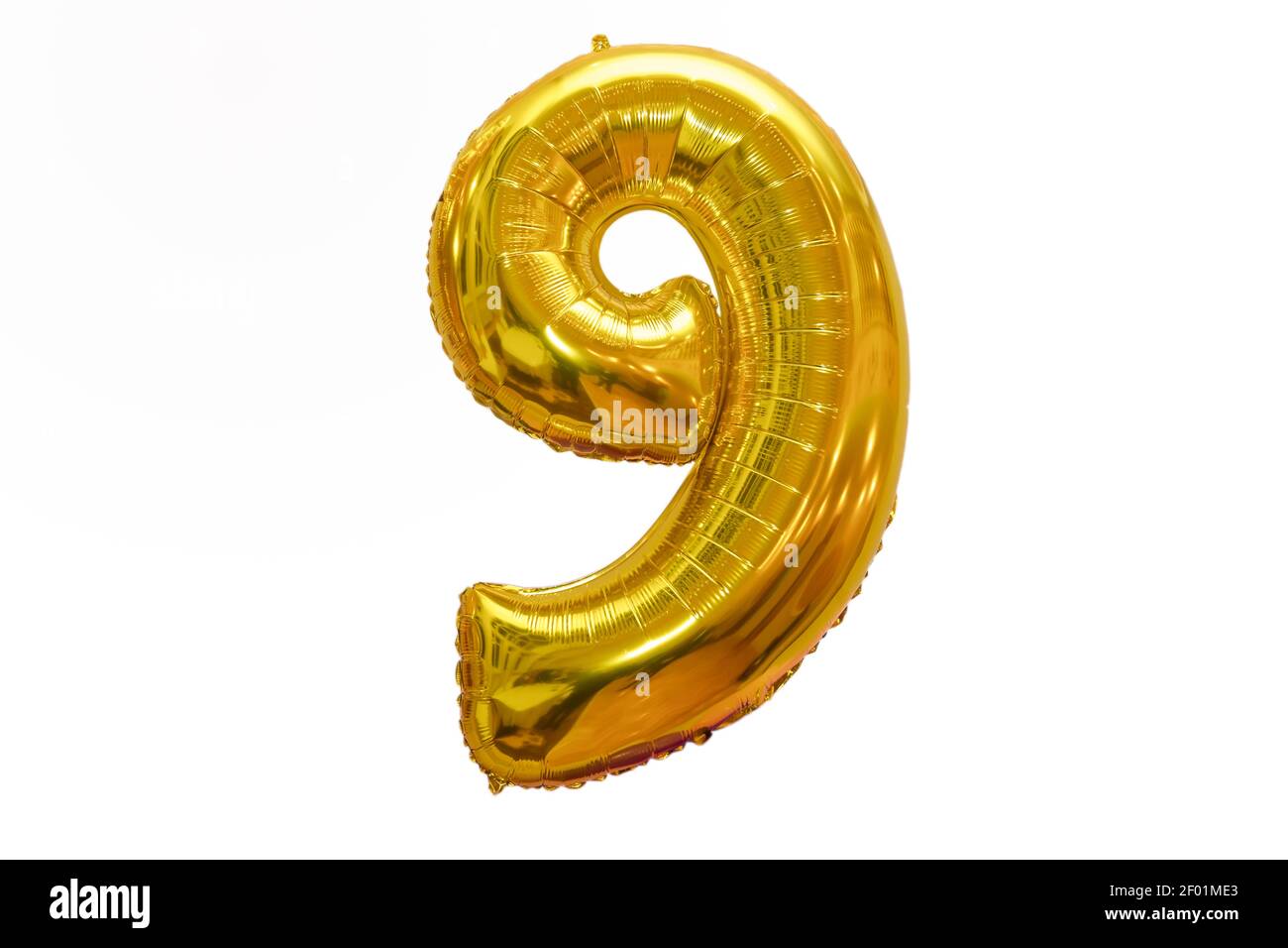 9 made of gold balloons isolated on white background. English 9 from ...