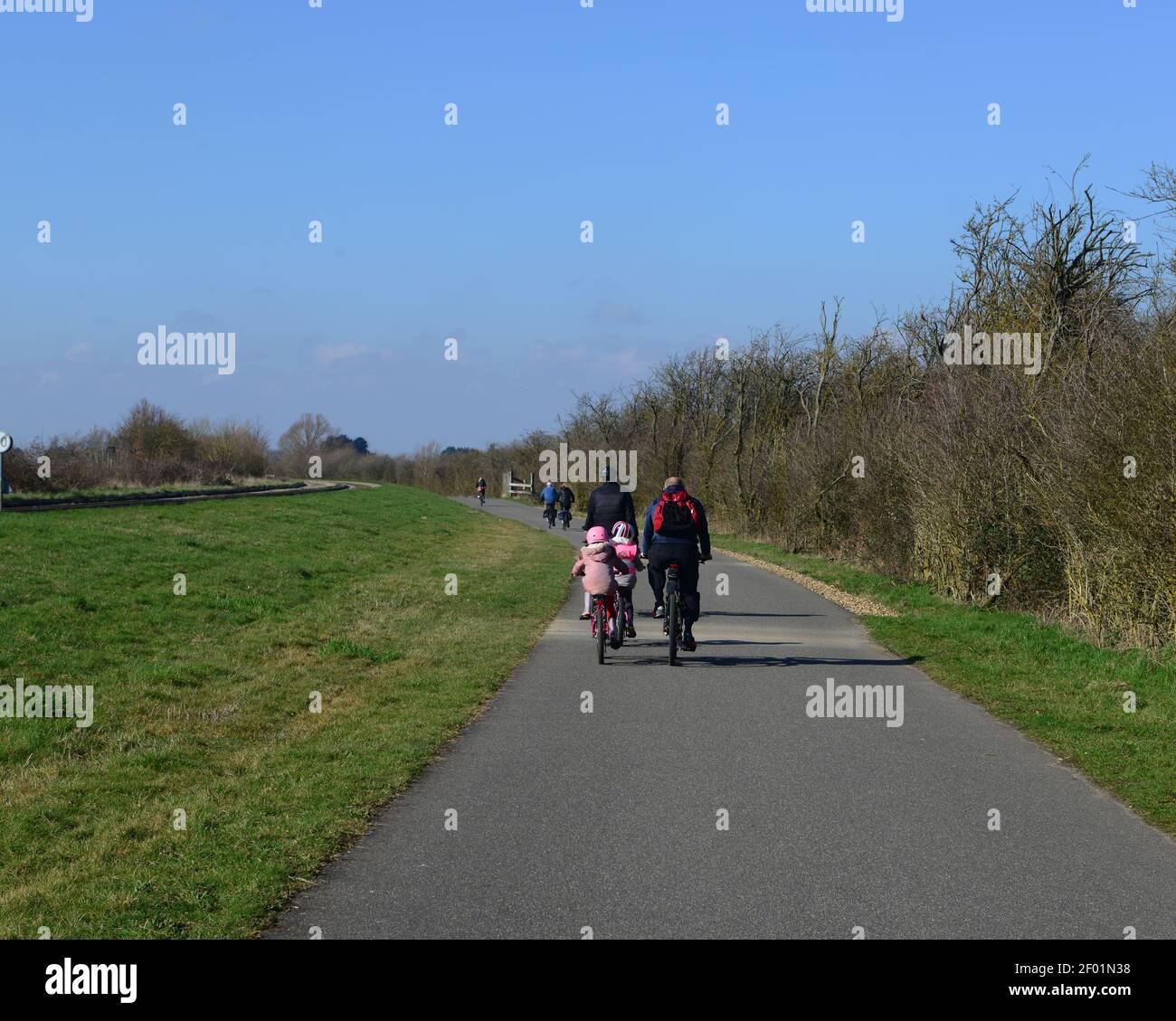 Cambridge, uk, Northstowe, 27-02-2021. Rear view of cyclists using the ...
