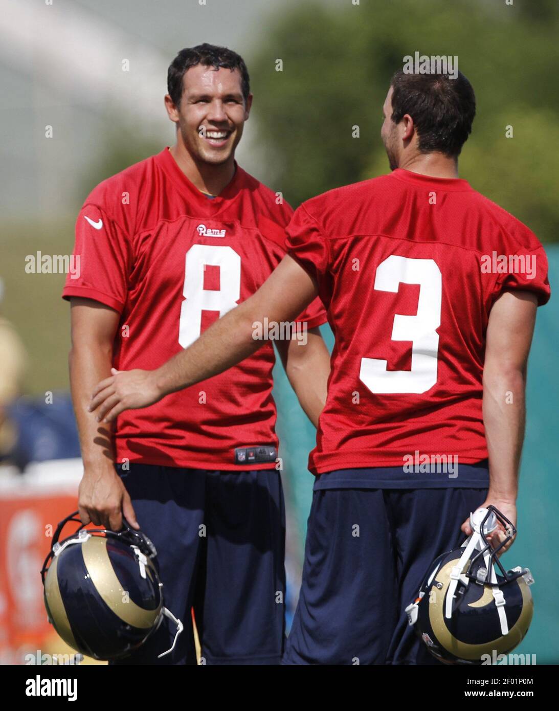 St. Louis Rams quarterbacks Sam Bradford and Timothy Jenkins (3) share ...