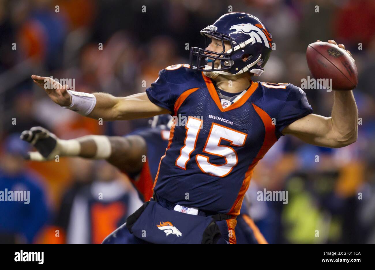 Denver Broncos quarterback Tim Tebow (15) throws a fourth-quarter pass ...