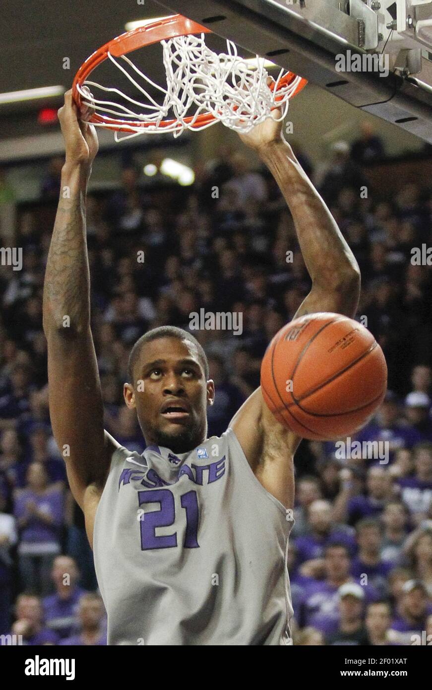 Kansas State's Jordan Henriquez dunks aginst Baylor during the first ...