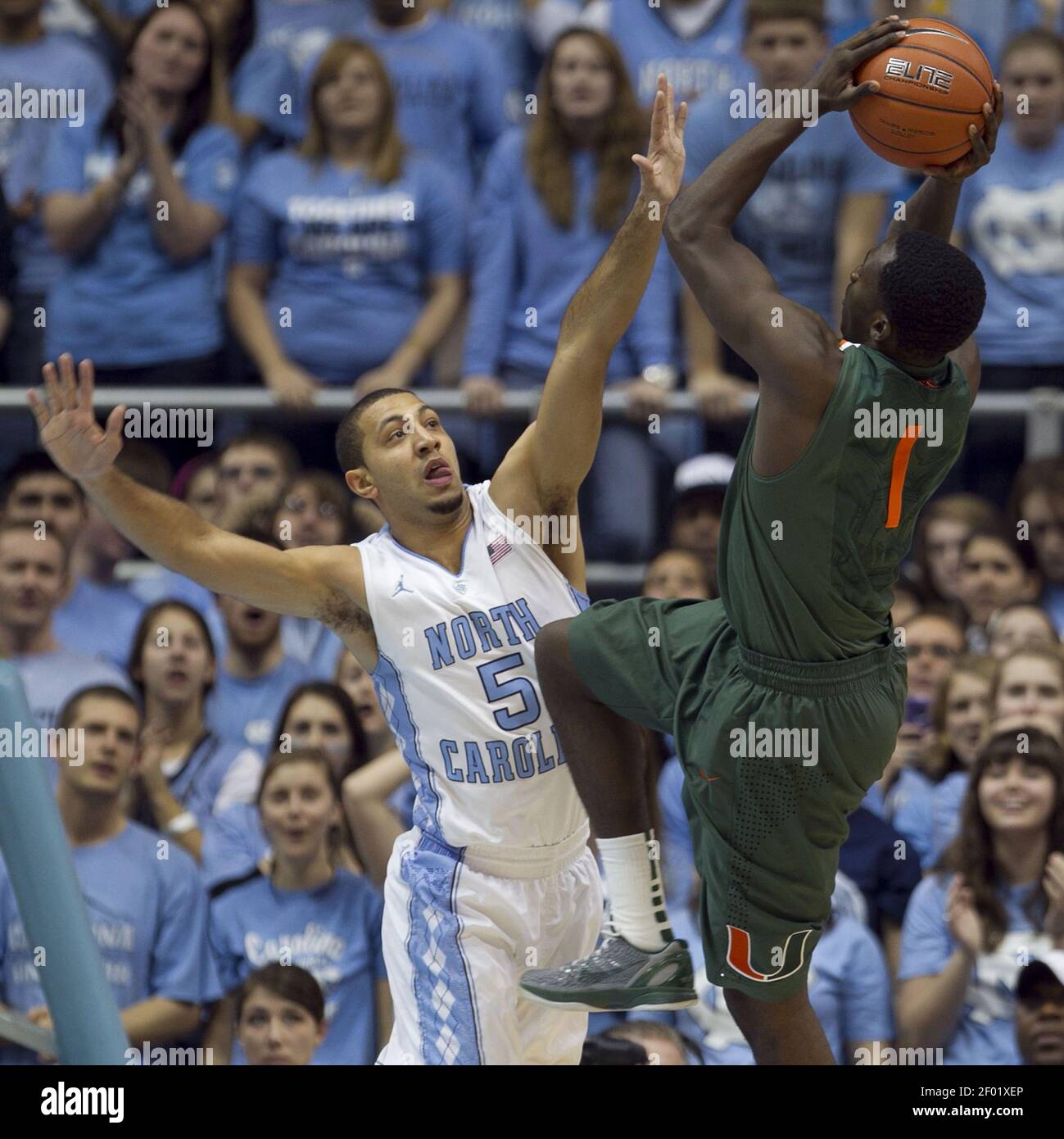 North Carolina's Kendall Marshall (5) defends Miami's Durand Scott (1 ...