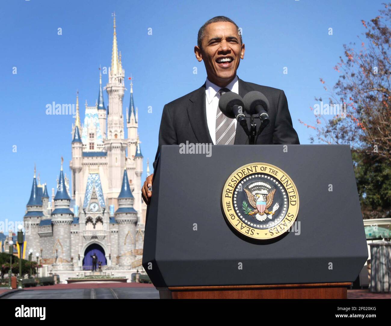 President Barack Obama responds to cheering guests as he takes the ...