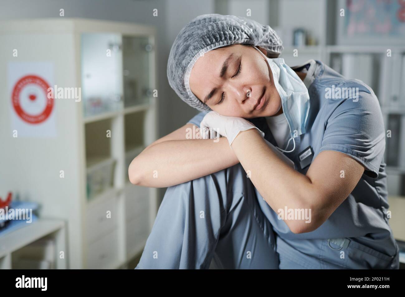 Front portrait tired nurse doctor hi-res stock photography and images ...