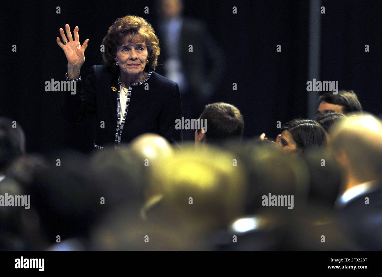 Sue Paterno waves to the crowd during the memorial for her husband ...