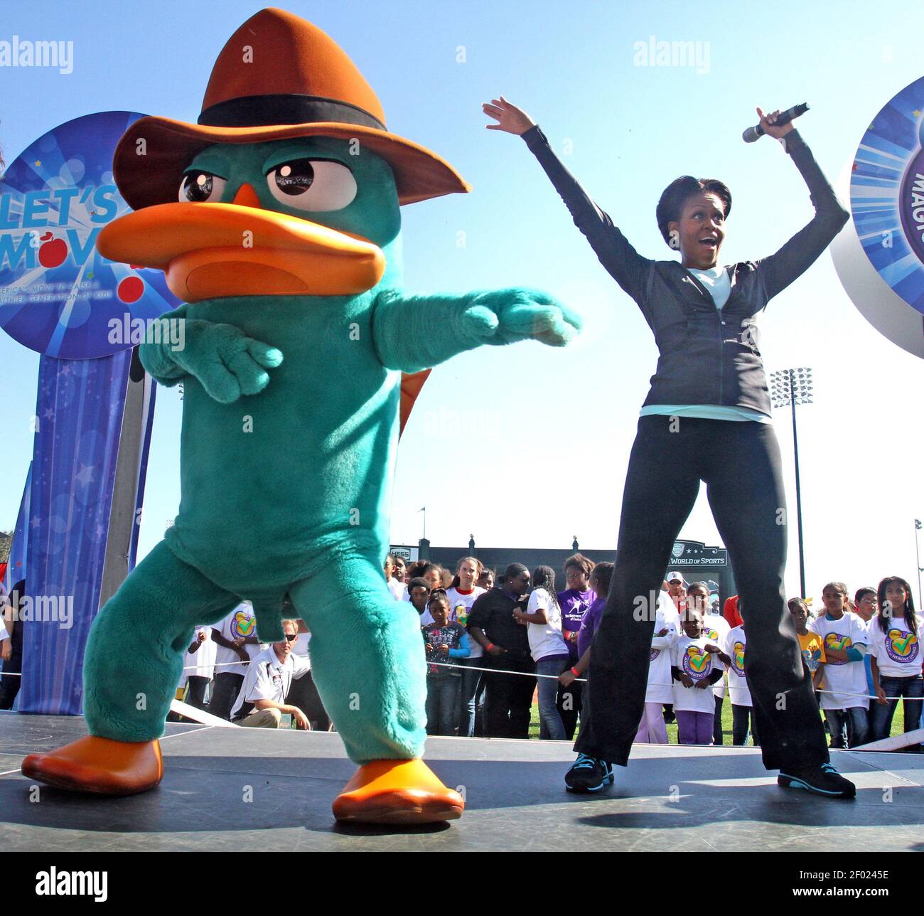First lady Michelle Obama dances with Disney Channel's Perry The ...