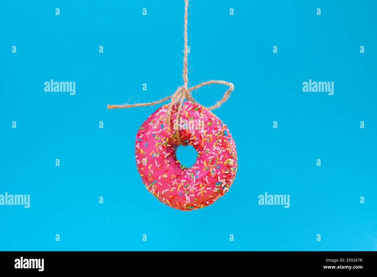 Doughnut hanging string hi-res stock photography and images - Alamy Doughnut hanging string hi-res stock photography and images - Alamy