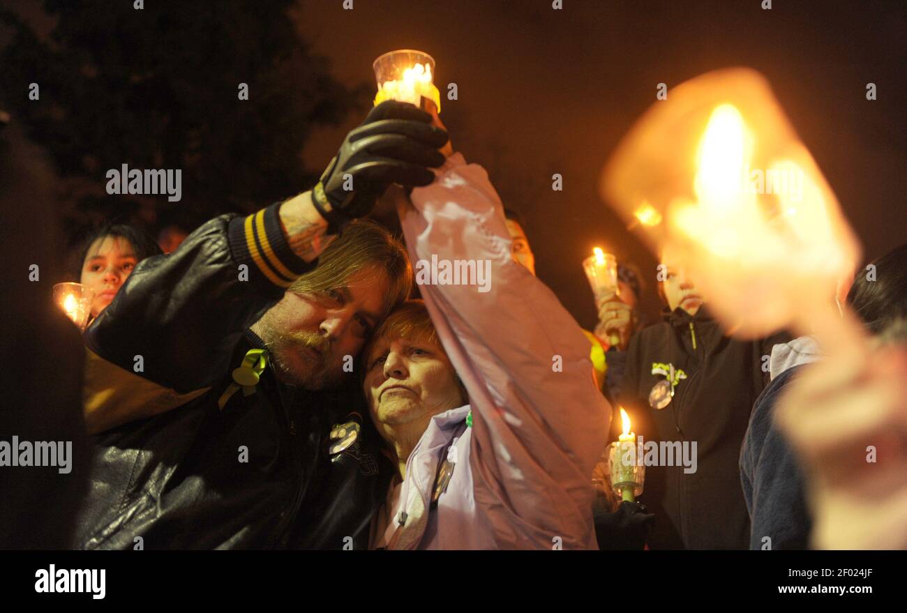James Koenig, the father of Samantha Koenig, and Shirley Koenig hold a ...