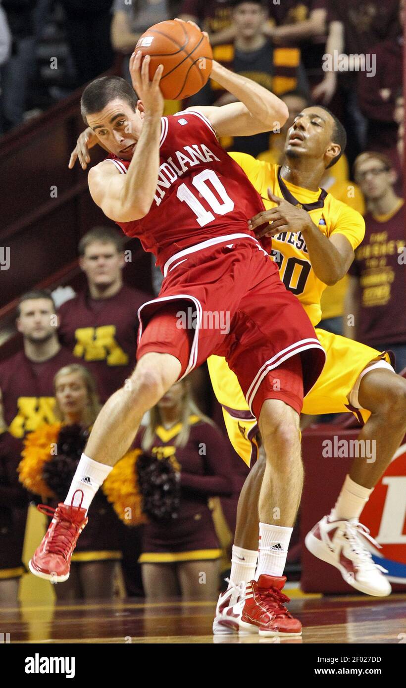 Indiana's Will Sheehey (10) pulls a rebound away from Minnesota's ...