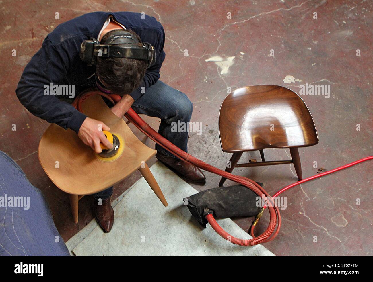 Noah Alexander works on a piece at Goebel & Co. Furniture in St. Louis ...