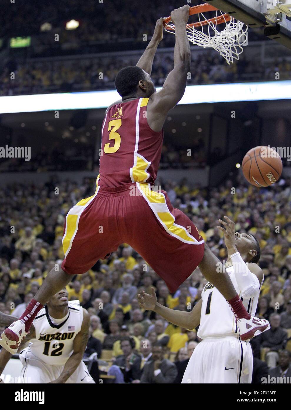 Iowa State's Melvin Ejim dunks over Missouri's Phil Pressey during the ...