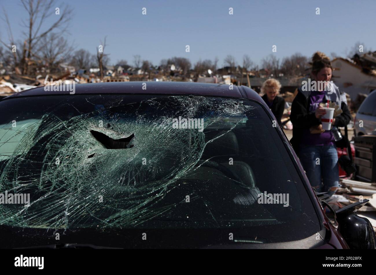 Mary Osman's damaged car is seen Thursday, March 1, 2012, after a ...