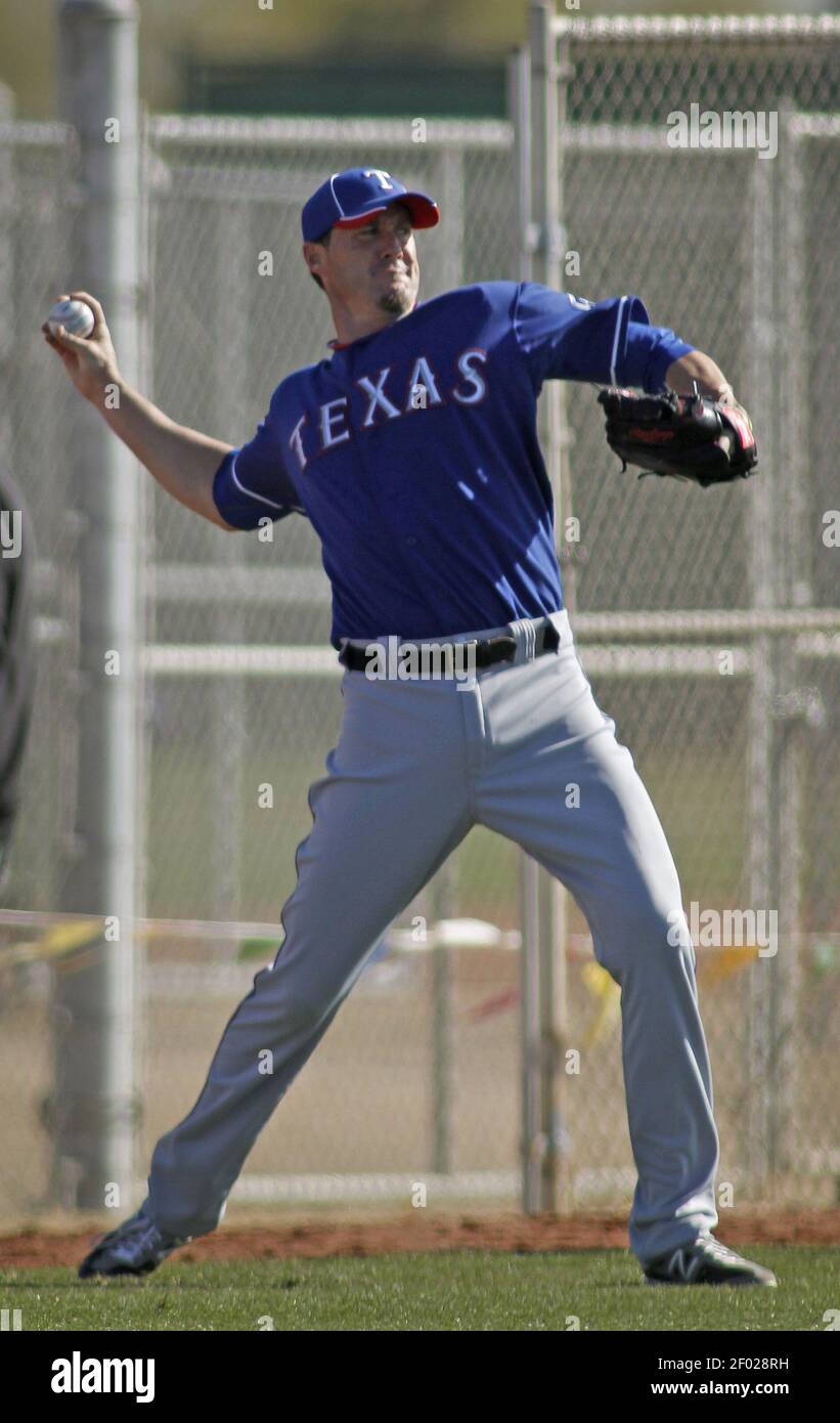 Texas Rangers relief pitcher Joe Nathan throws during spring training ...