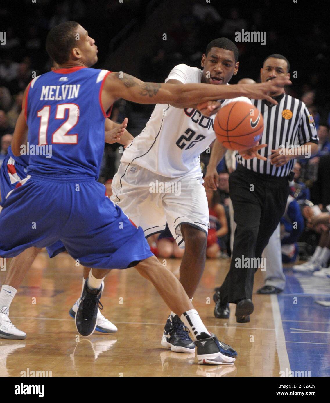 University of Connecticut senior forward, Roscoe Smith (22) passes ...