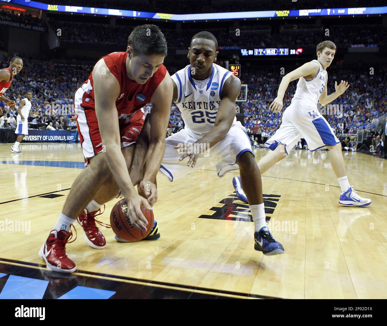 Kentucky's Marquis Teague and Western Kentucky's Vinny Zollo battled ...