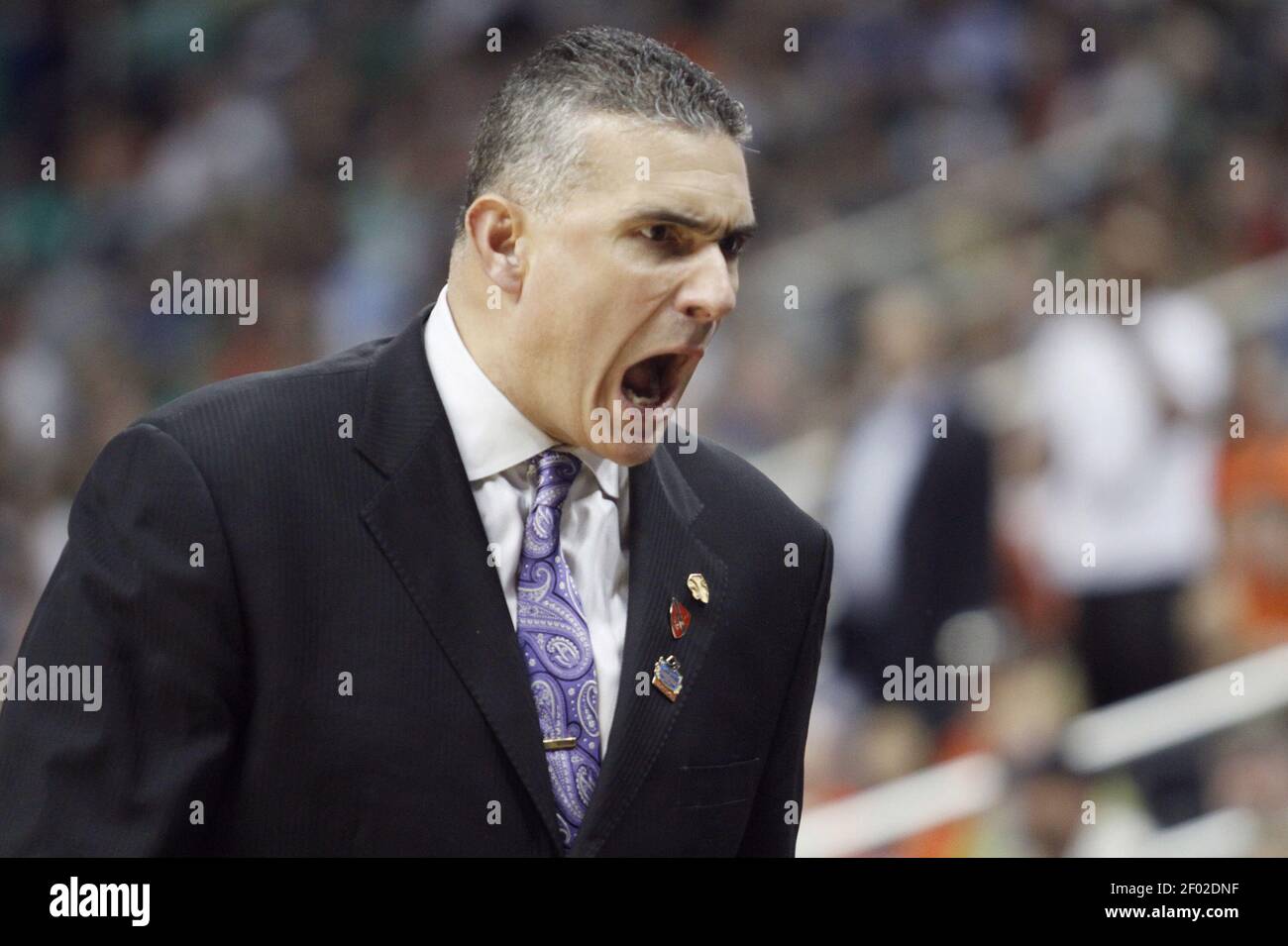 Kansas State coach Frank Martin yells at his players on the bench ...