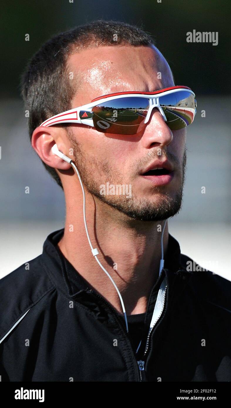 Olympian Jeremy Wariner warms up for the 200 meter dash at the Bobby ...