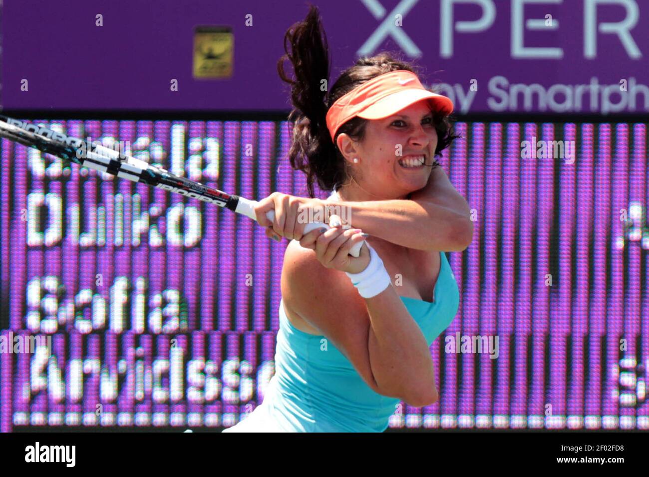 Sofia Arvidsson of Sweden returns a ball to Gisela Dulko of Aregentina during the Sony Ericsson ...