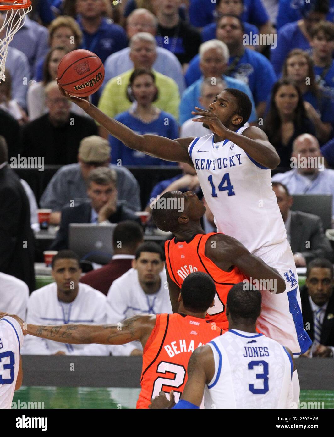Michael Kidd-Gilchrist (14) of Kentucky goes over Gorgui Dieng of ...