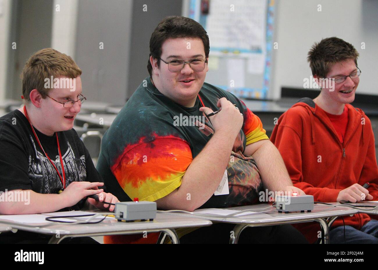Jake Watters, 16, center, sits with fellow Alton High School students ...