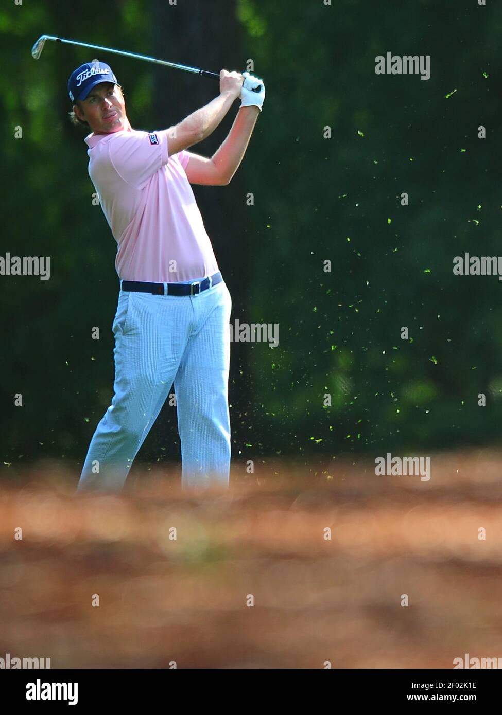 Golfer Webb Simpson hits a drive on the 13th fairway during a practice ...