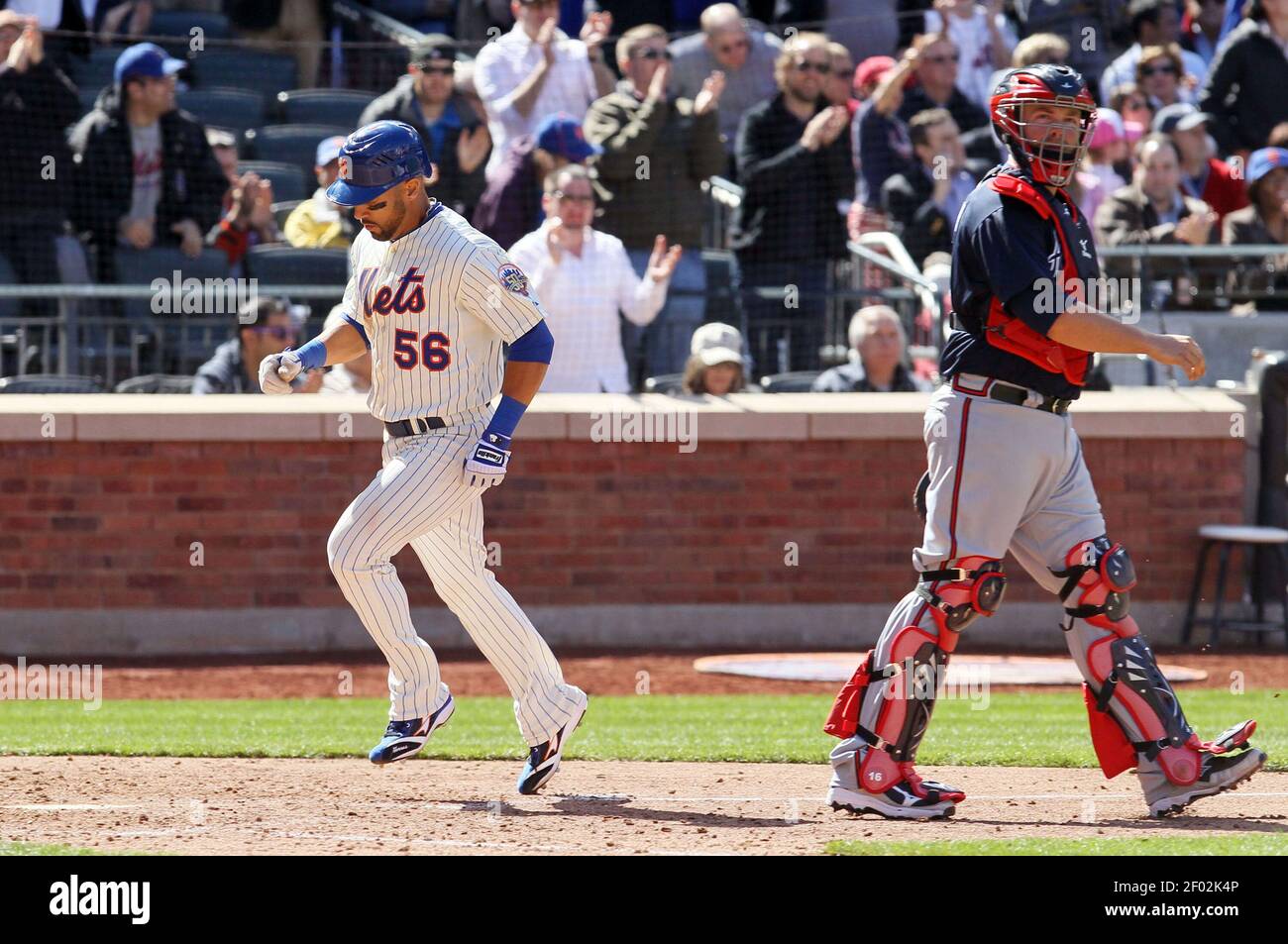 Andres Torres of the New York Mets scores a sixth inning run past Brian ...