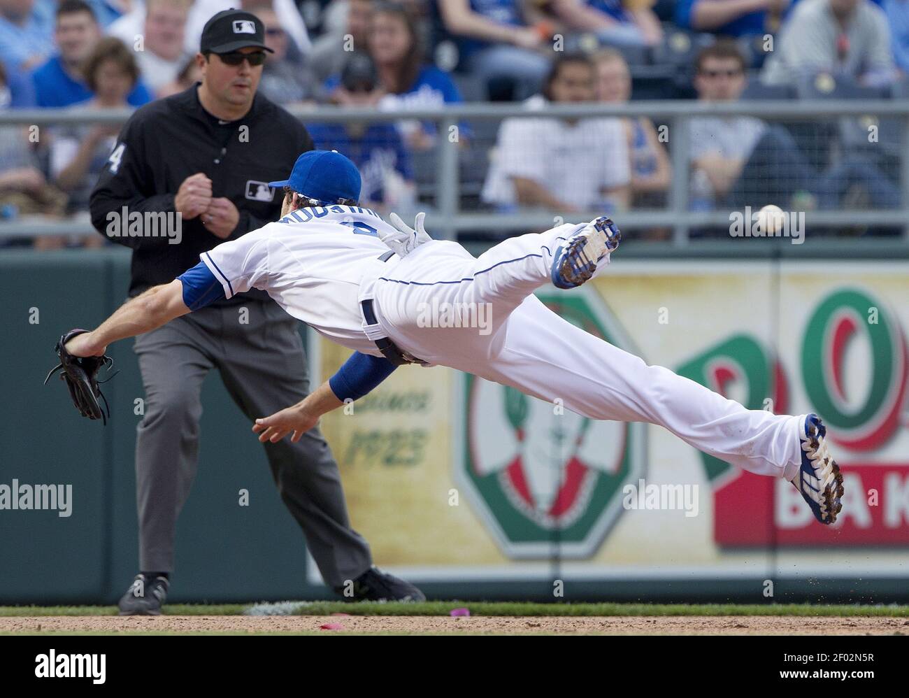 Kansas City Royals third baseman Mike Moustakas (8) can't make the ...