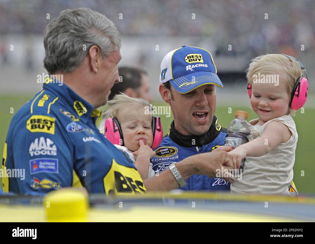 On pit row before the race, pole sitter Martin Truex Jr. holds his ...