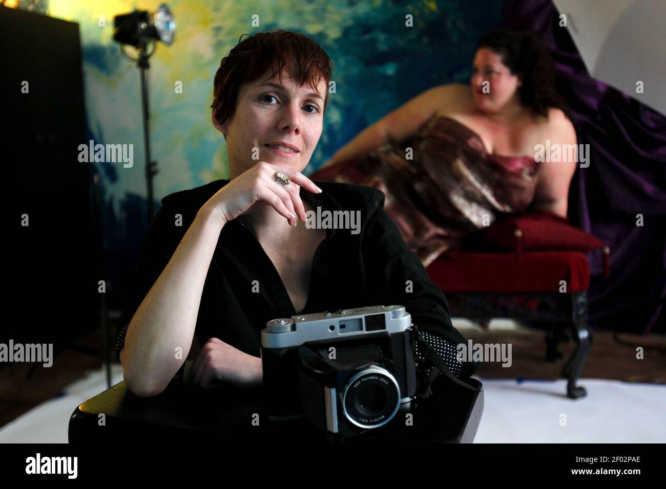 Photographer Mariah Carle, of Oakland, left, poses for a photograph in ...
