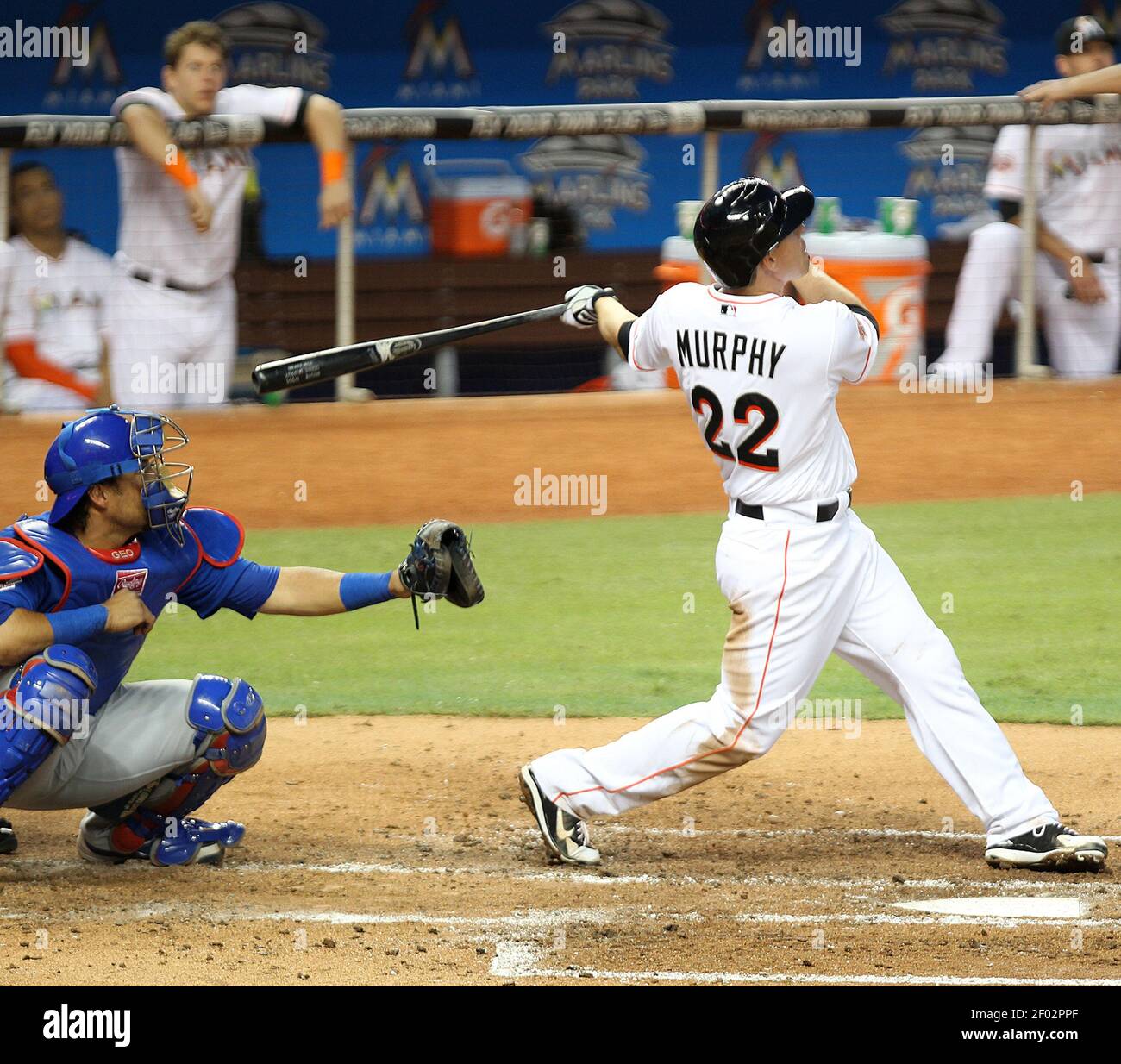 The Miami Marlins' Donnie Murphy follows through on a home run during ...