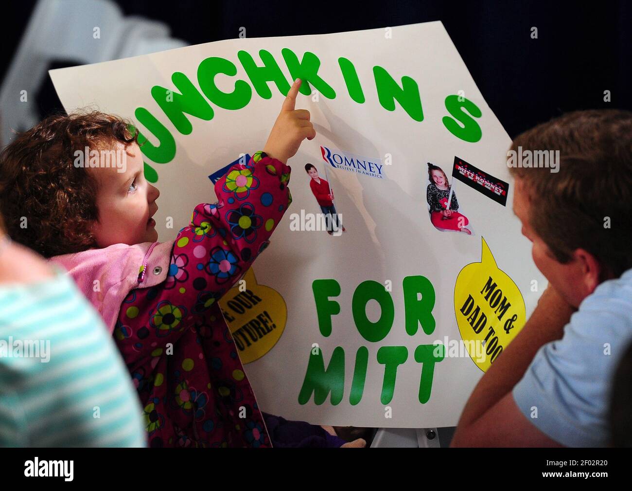 Lydia Richardson, 2, points out letters to her father, Aaron Richardson ...