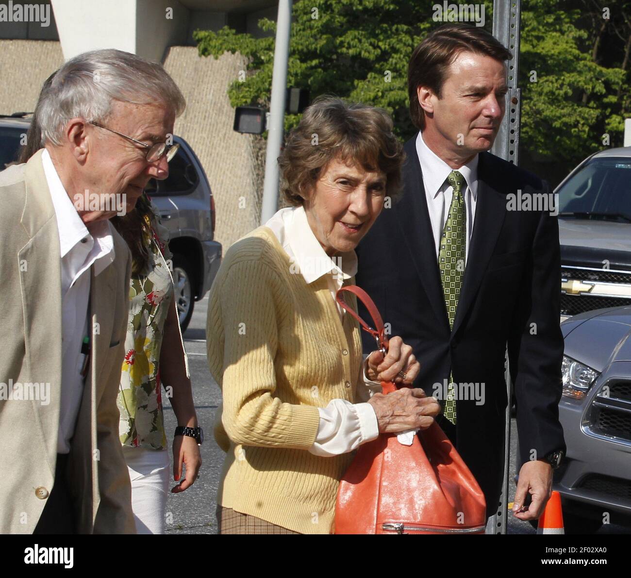 Former Sen. John Edwards, right, leads his mother Bobbie Edwards ...