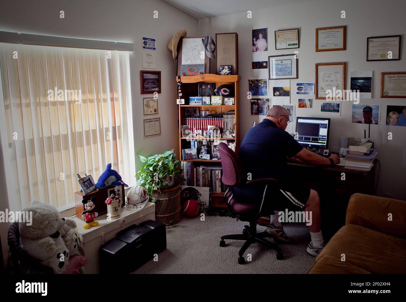 Larry Roark, 61, looks over radio signals from out of space looking for ...